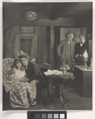 [Two older men watching Lucille Ricksen and young suitor, "Idle Tongues ...