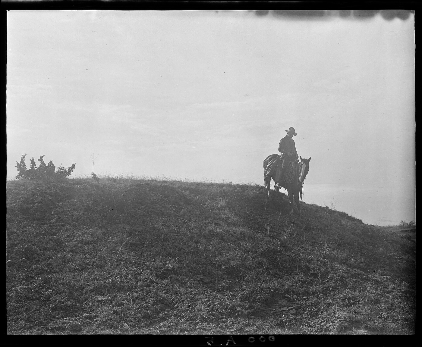 Edwin Sanders, cousin of the photographer, Erwin E. Smith, descending a ...
