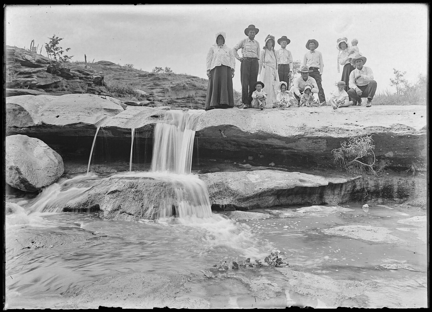 Two families of small ranchers standing above the falls at Blanco ...