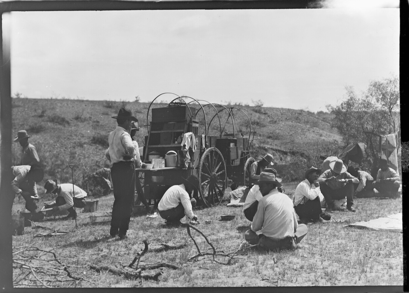 The Spur cowpunchers are having a meal at the chuck wagon. Spur Ranch ...