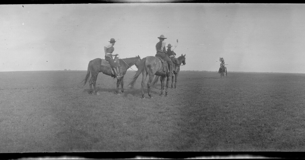 An indian giving the sign of peace to three mounted cowboys. Matador ...